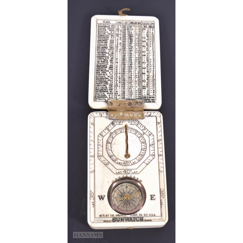 A CARVED BONE SCRIMSHAW COMPASS. 163.2 grams. 6 cm x 9 cm.