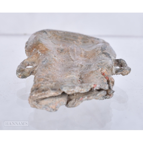 A 15th Century lead Pilgrim's Ampulla decorated with a central flower 5cm.