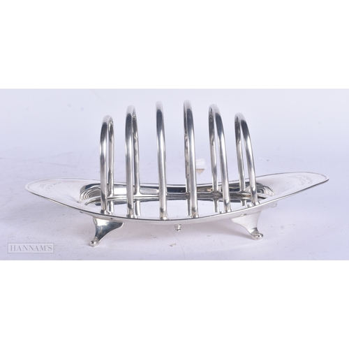 A VICTORIAN SILVER TOAST RACK Horace Woodward, presented to Lieutenant ...