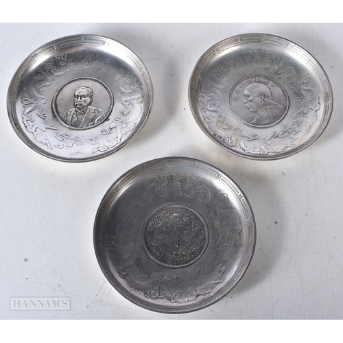 A set of three Chinese white metal coin dish 330g, 1.4 x 9.3 cm. (3)