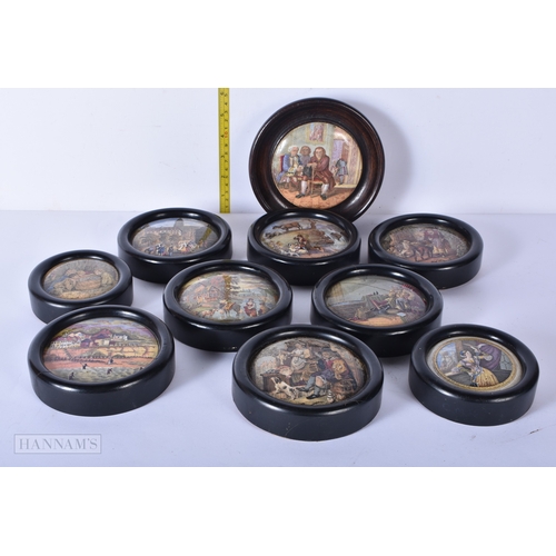 A collection of antique framed ceramic pot lids 15.5 cm