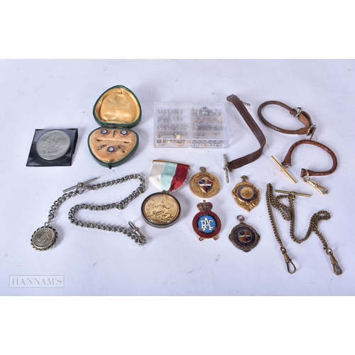 A small compass on a fob together with a collection of watch winders ...