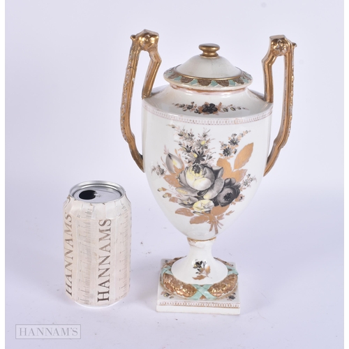 AN ANTIQUE GERMAN AUGUSTUS REX PORCELAIN TWIN HANDLED VASE AND COVER ...