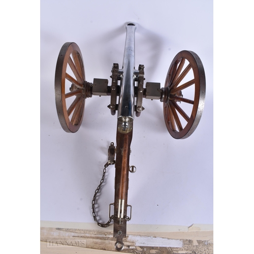 A COUNTRY HOUSE HAND CRANK MODEL OF A CANNON. 65 cm x 30 cm.