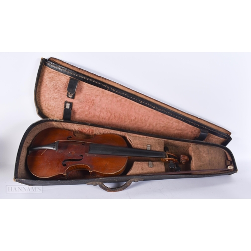 A CASED VIOLIN WITH BOW. Violin 59 cm long, length of back 38 cm. (2)