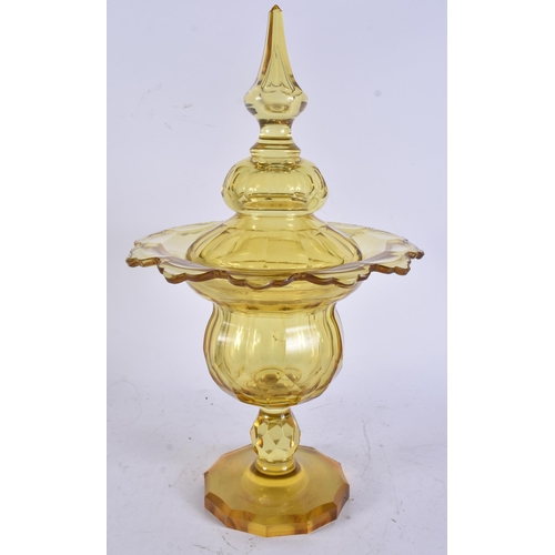 A LARGE ANTIQUE SMOKEY MUSTARD YELLOW GLASS VASE AND COVER possibly ...