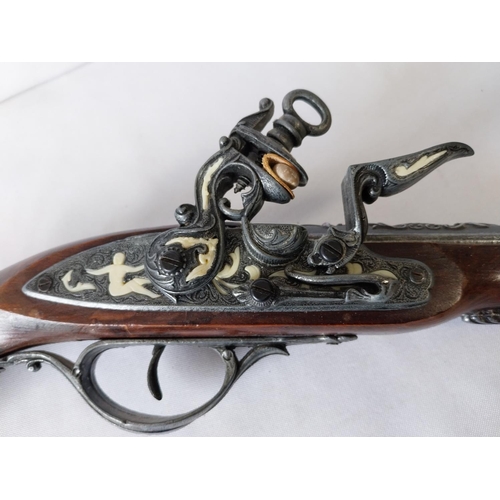 Vintage reproduction flintlock gun