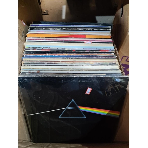 Box of vinyl LP records including 1970s rock