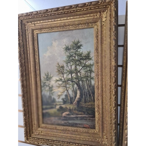 A pair of Victorian style oil paintings of figures in wooded landscape ...
