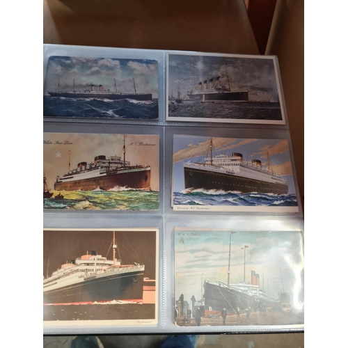Three albums of vintage postcards and later including many 100's of ...