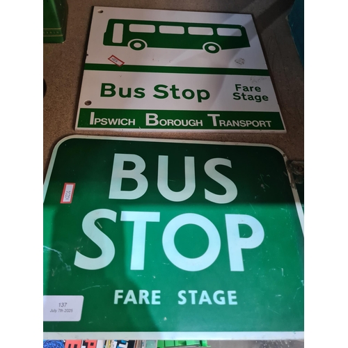 Two Bus Stops signs