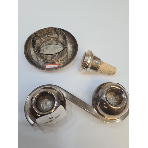 An interesting candle holder in a figure 8 design, engraved makers mark ...