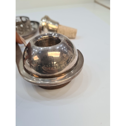 An interesting candle holder in a figure 8 design, engraved makers mark ...