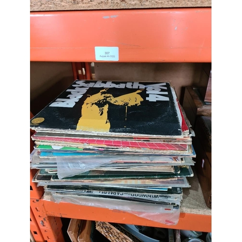 A quantity of 1970s vinyl records including rock and pop.