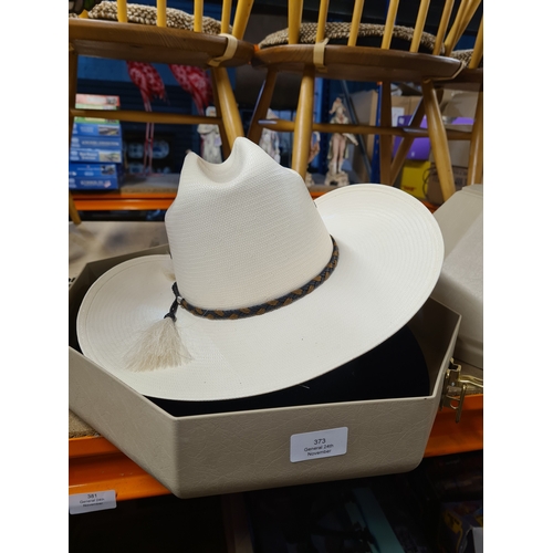 Two America Stetson hats by Paris Hatters and a beaver example, by John ...