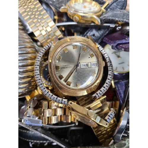 Two jewellery boxes containing a quantity of variou fashion watches to ...