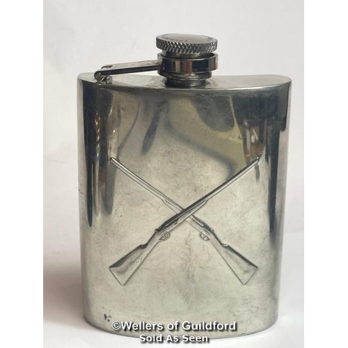 A pewter hip flask decorated with rifles by J.Purdy & Sons, novelty ...