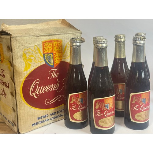 Twelve assorted bottles of beer. Including Guiness, Queens Ale, and ...