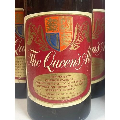 Twelve assorted bottles of beer. Including Guiness, Queens Ale, and ...