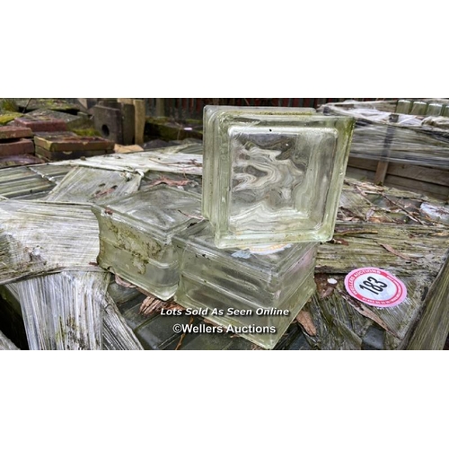 FOUR CRATES OF ASSORTED GLASS BRICKS, MIXED SIZES