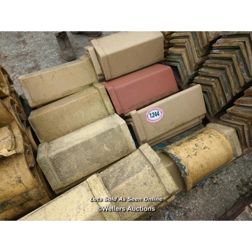 APPROX X25 ASSORTED MOSTLY YELLOW ANGLED RIDGE ROOF TILES, LARGEST 48CM (L)