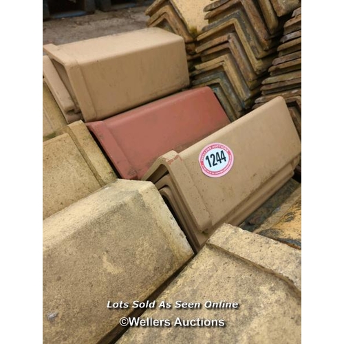 APPROX X25 ASSORTED MOSTLY YELLOW ANGLED RIDGE ROOF TILES, LARGEST 48CM (L)