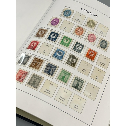 A Germany stamp collection housed in a Stanley Gibbons Davo ...