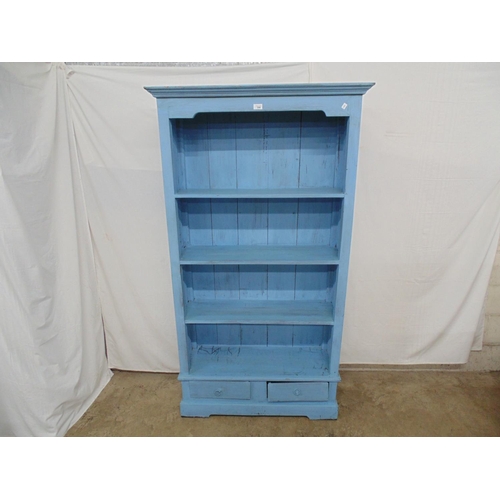 Hardwood blue painted bookcase with three fixed shelves over two drawer ...