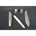Two silver thimbles together with a Rogers Mother of Pearl handled ...