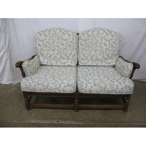 Dark Ercol "Old Colonial" three piece suite with footstool comprising ...