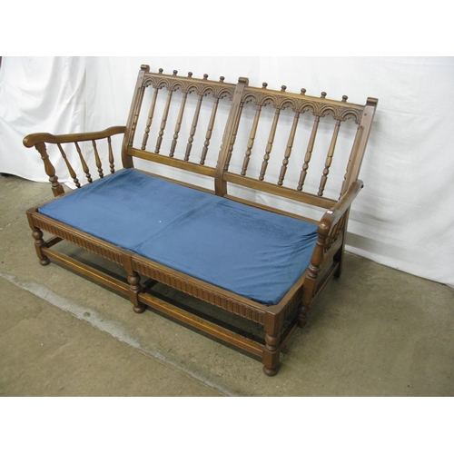 Dark Ercol "Old Colonial" three piece suite with footstool comprising ...