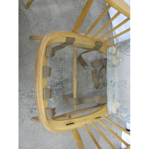 Blonde Ercol Evergreen high back armchair with stick back, label to ...