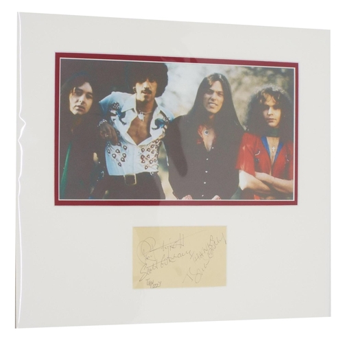 Thin Lizzy - autographed page bearing the signatures of Philip Lynott ...