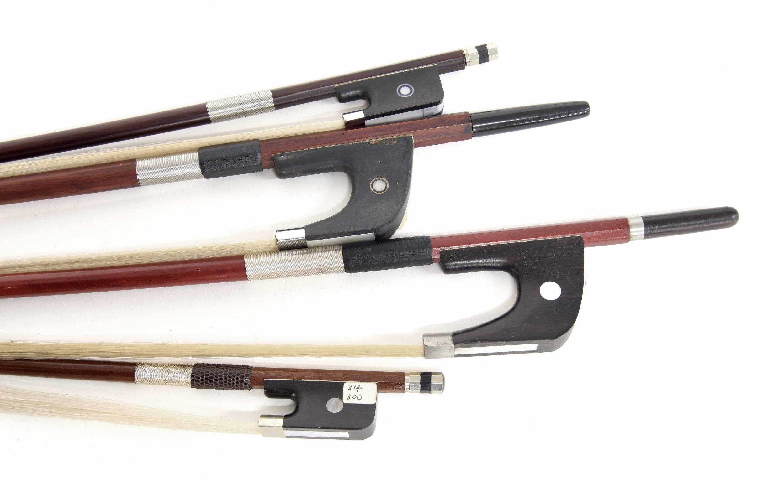 Two modern German Dragonetti style double bass bows; also a modern ...