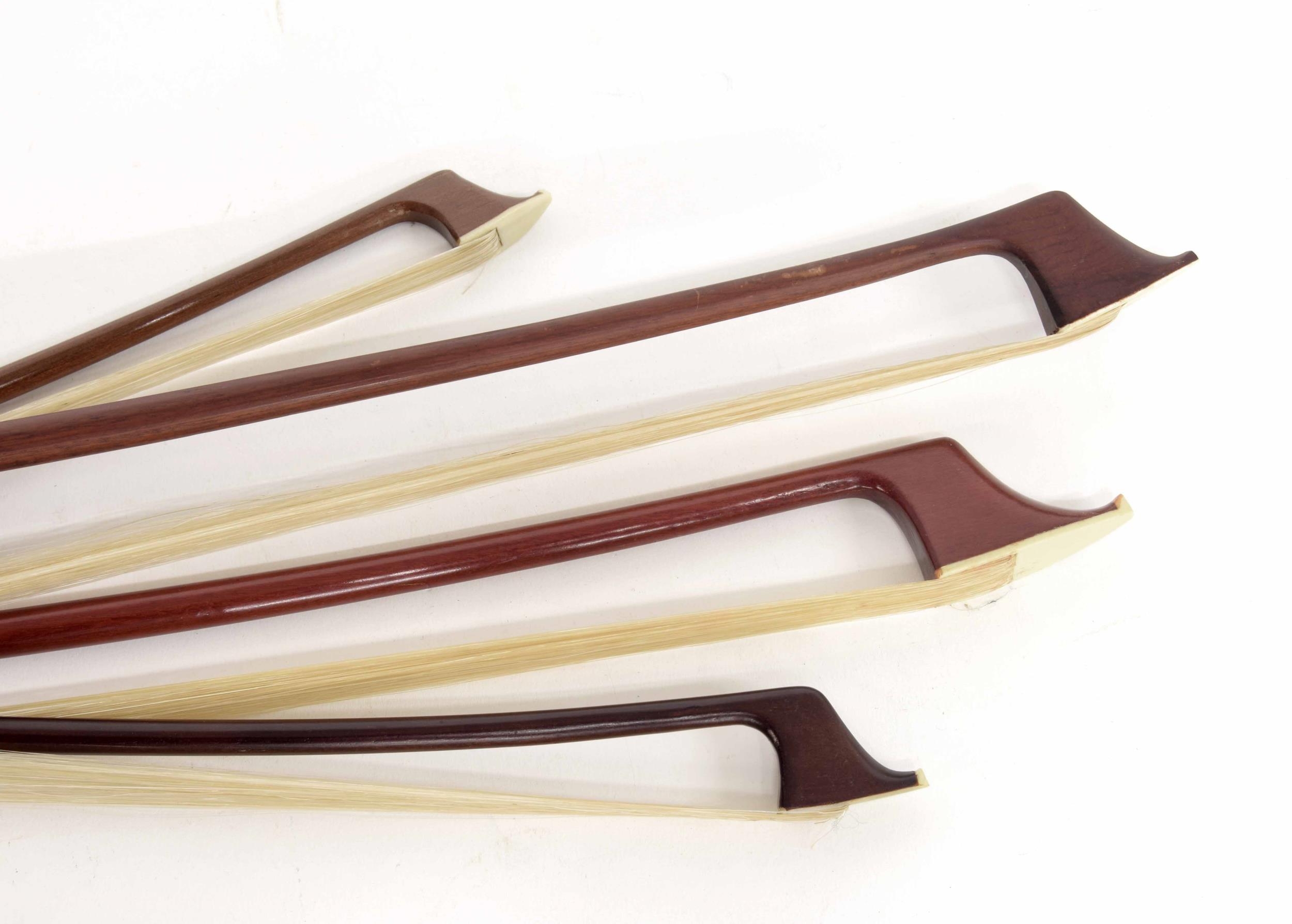 Two modern German Dragonetti style double bass bows; also a modern ...