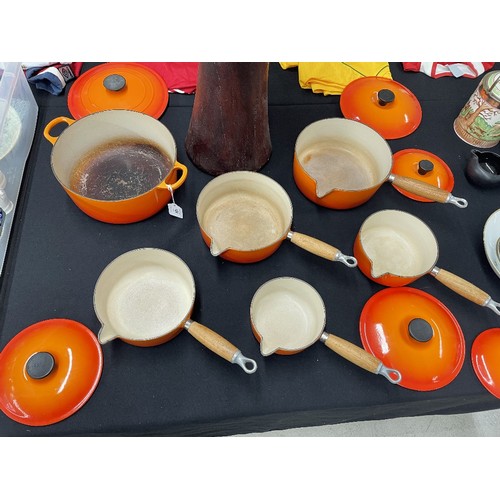 Le Creuset - graduated set of five pans with lids, colour flame, sizes ...