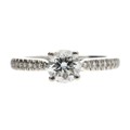 Good GIA certified platinum solitaire diamond ring with set shoulders, round brilliant-cut, 0.59ct a