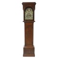 Oak eight day longcase clock, the 12" brass arched dial signed Thomas ...