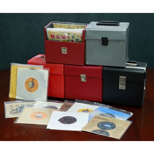 Selection of 45rpm vinyl records within four vintage 45. cases ...