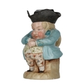 Continental pottery Toby jug with cover, modelled as a standing rotund ...