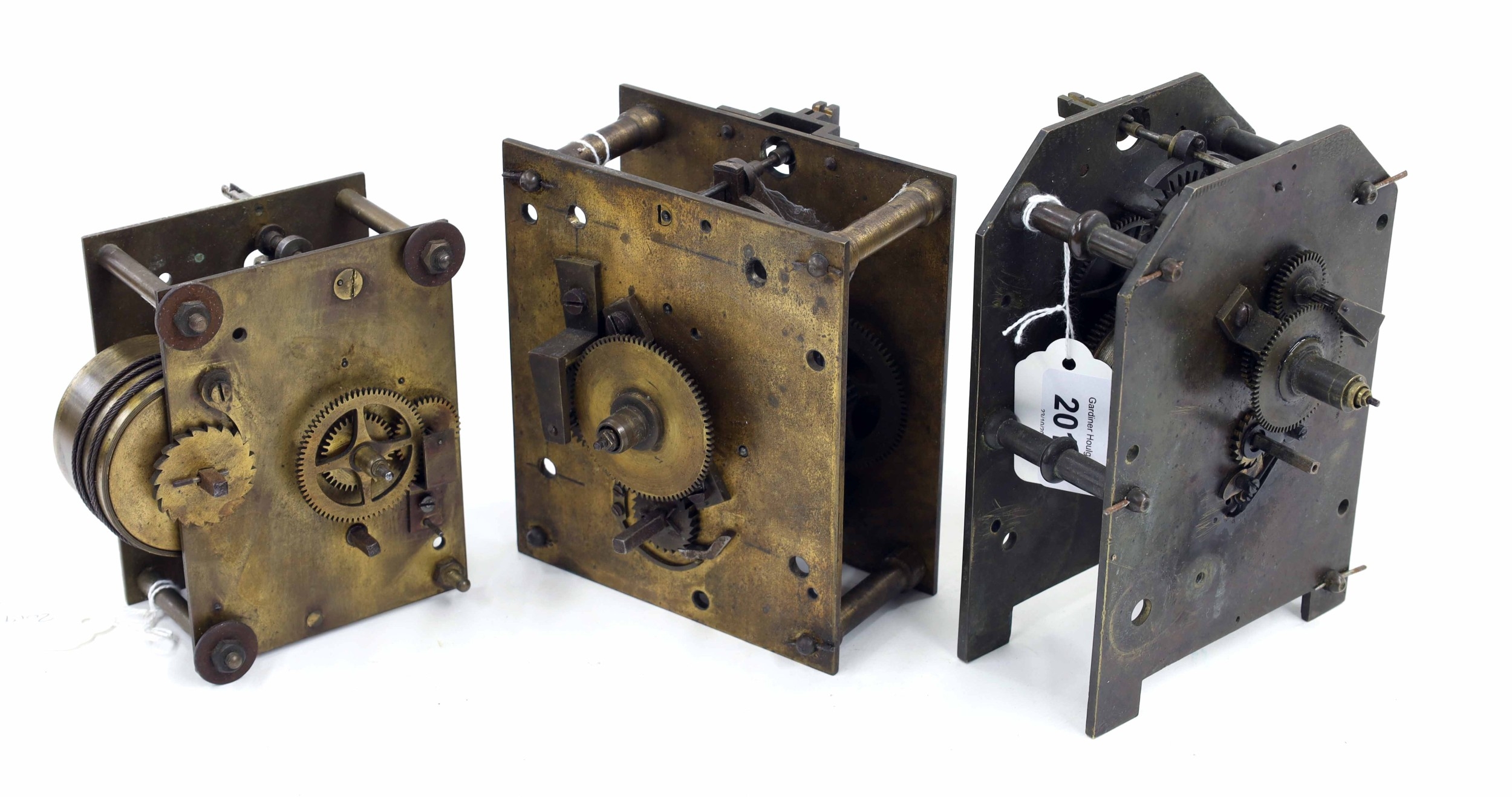 Single fusee clock movement with two single train clock movements, one ...