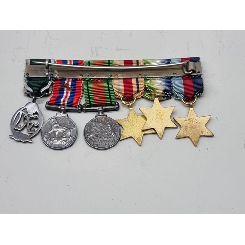 Medals: a group of seven, to Lieutenant Commander F.N.B Johnson, R.N ...
