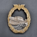A WWII German Kriegsmarine E-Boat badge, first pattern, by Schwerin ...
