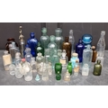 A collection of glass bottles, to include Chichester examples.