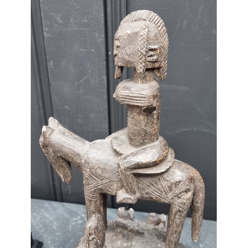 Ethnographica: a mixed group of tribal items, to include: a bronze ...