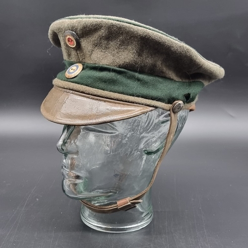 A WWI Imperial German model 1917 field cap, inscribed to interior 'B.X ...