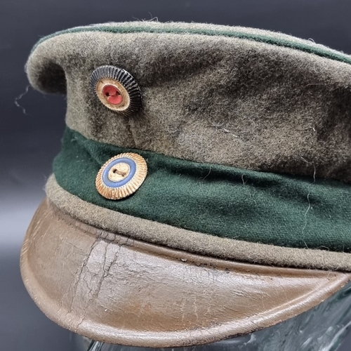 A WWI Imperial German model 1917 field cap, inscribed to interior 'B.X ...