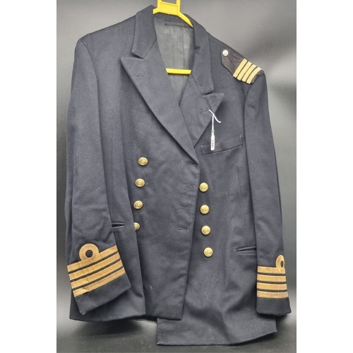 A Royal Navy captain's jacket and cap. (2)
