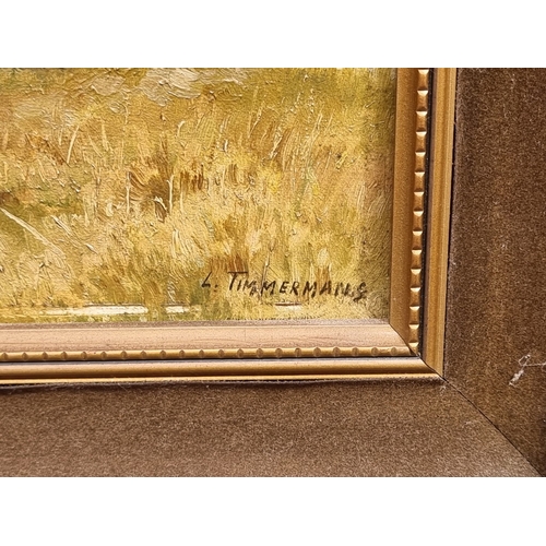 Louis Timmermans, a Dutch river scene, signed, oil on mahogany panel ...