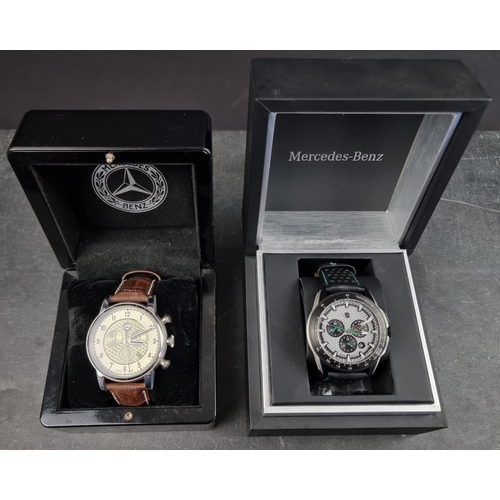 Two Mercedes Benz quartz wristwatches, largest 45mm, both boxed. (2)